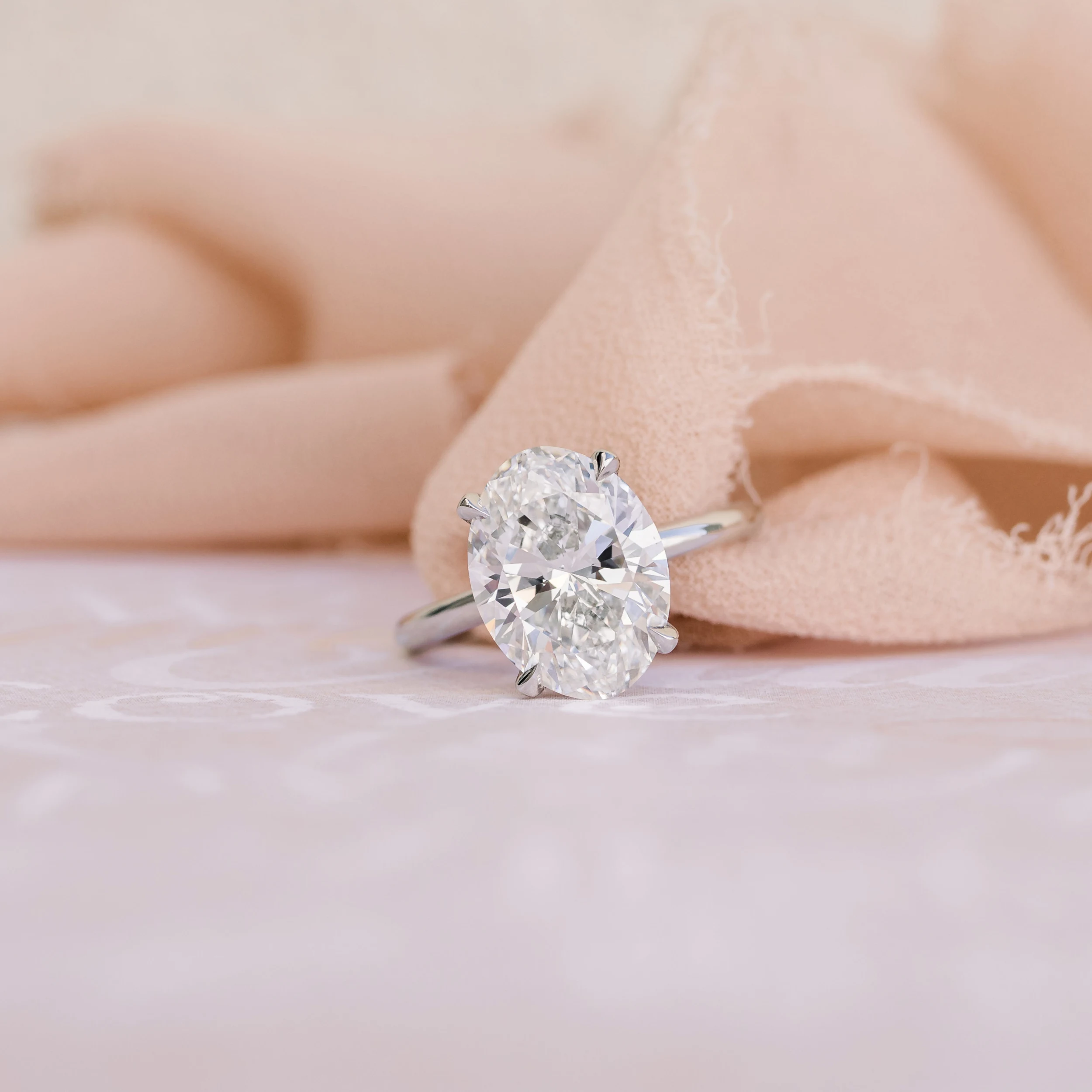 Oval Petite Four Prong Solitaire Diamond Engagement Ring