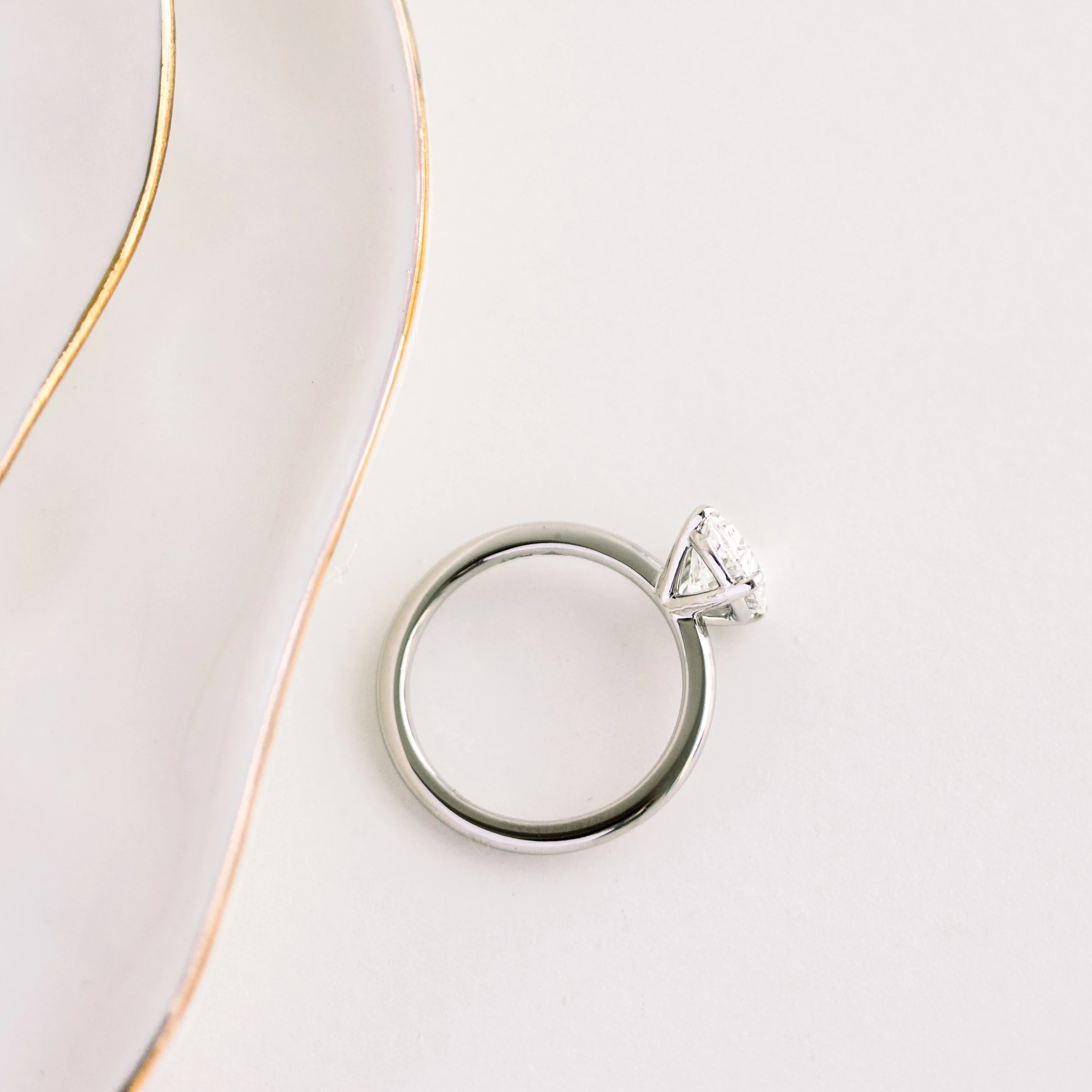 Oval Petite Four Prong Solitaire Diamond Engagement Ring