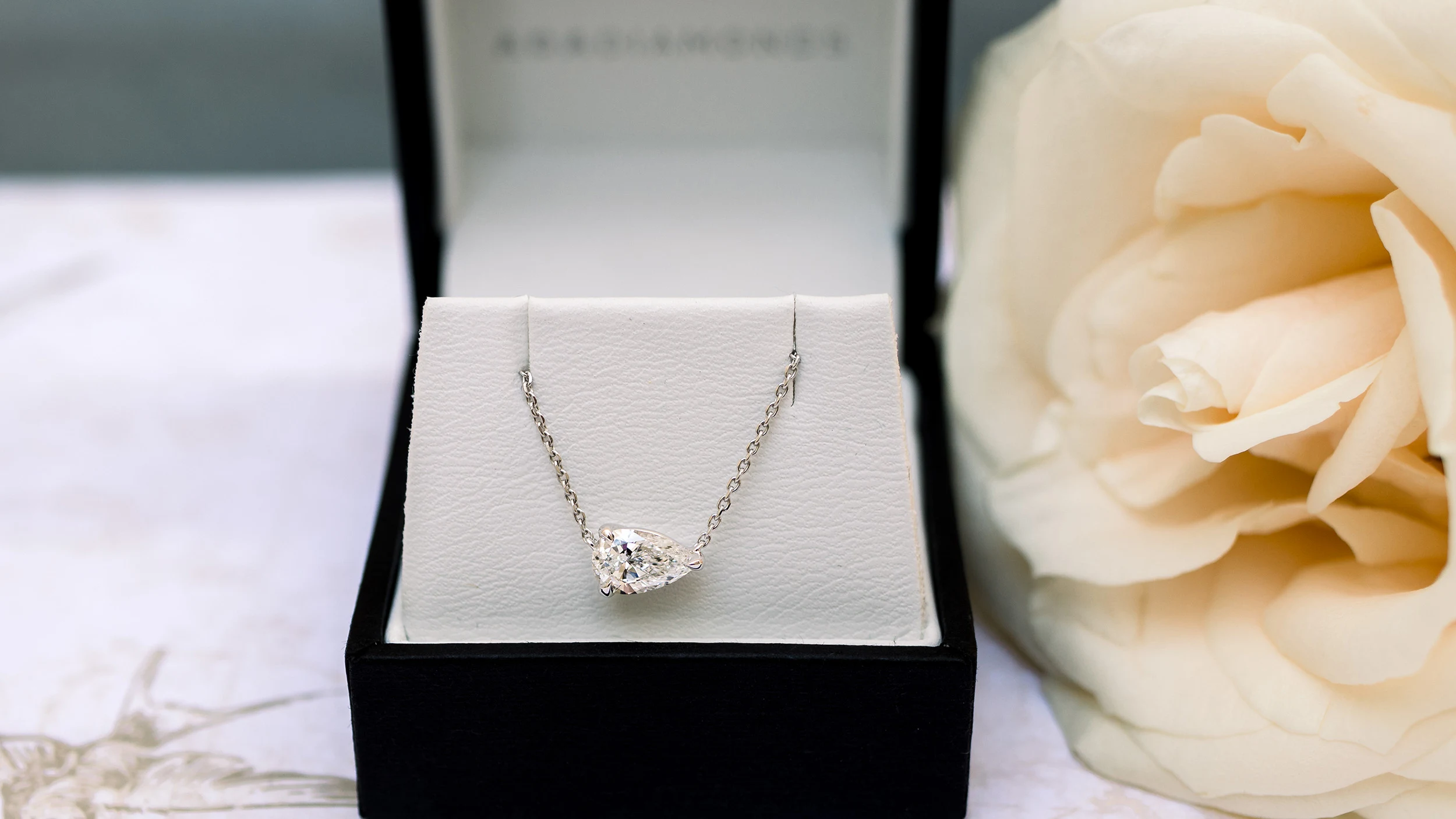 Floating Pear Diamond Pendant